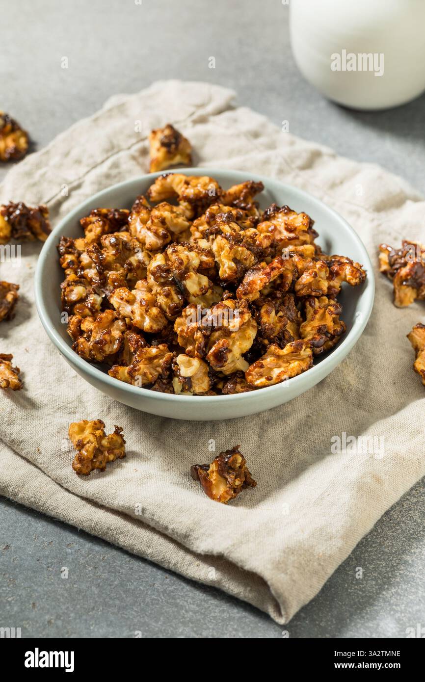 Sweet Homemade Candied Walnut Pieces in a Bowl with Cinnamon Sugar ...