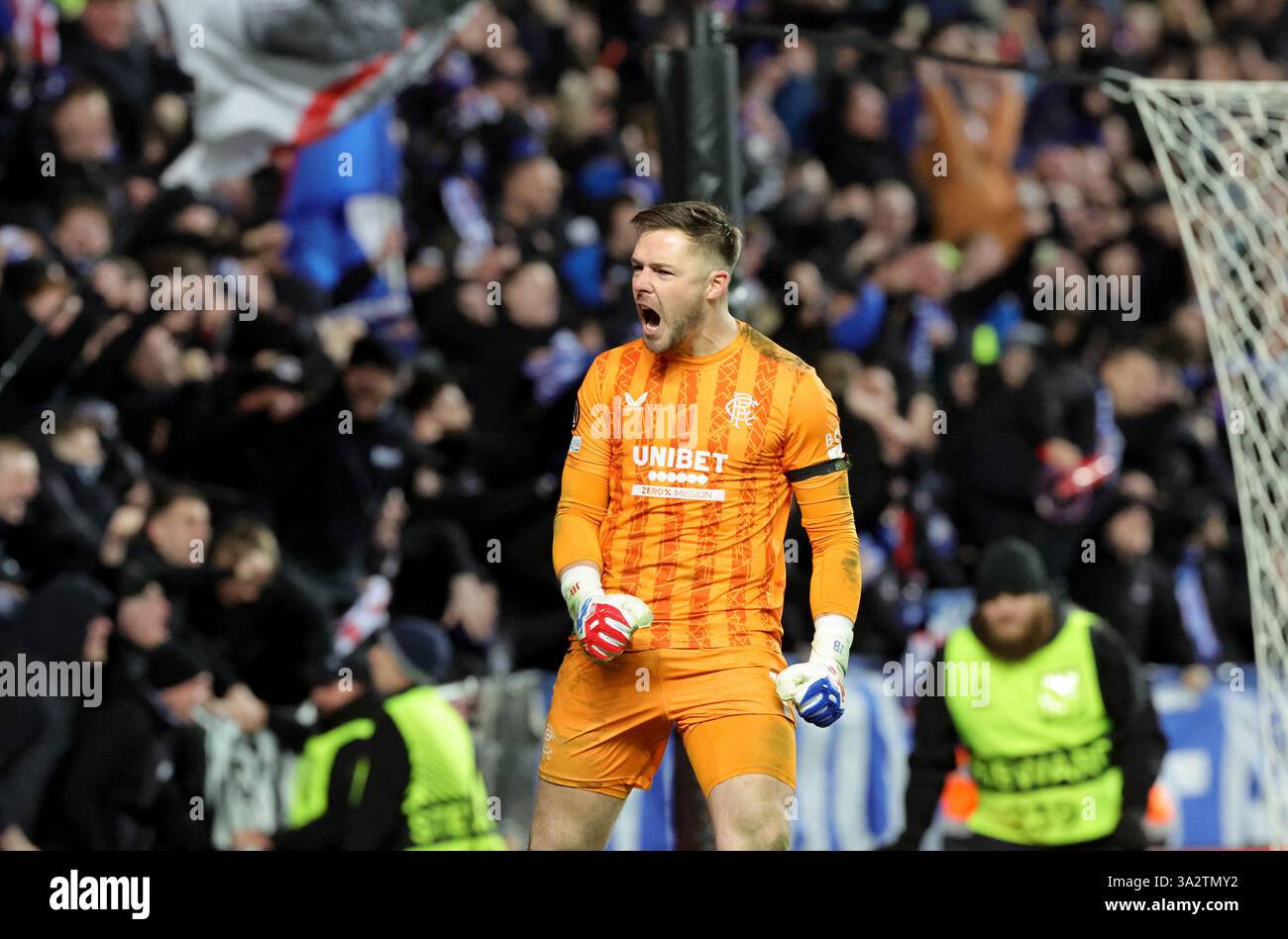 Rangers goalkeeper Jack Butland celebrates after saving a penalty ...