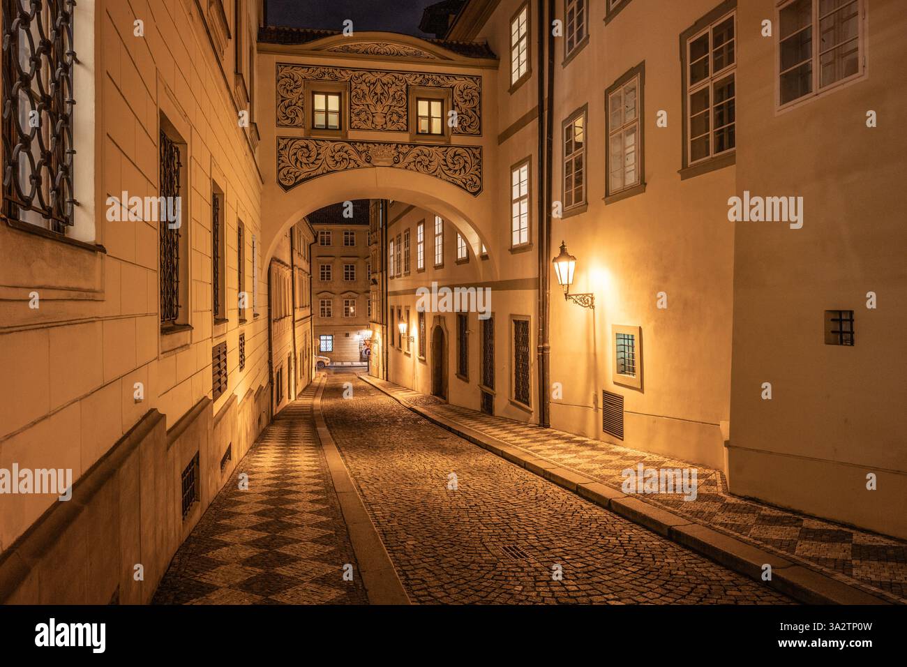 Illuminated by warm street lights, Thunovska Street showcases the ...