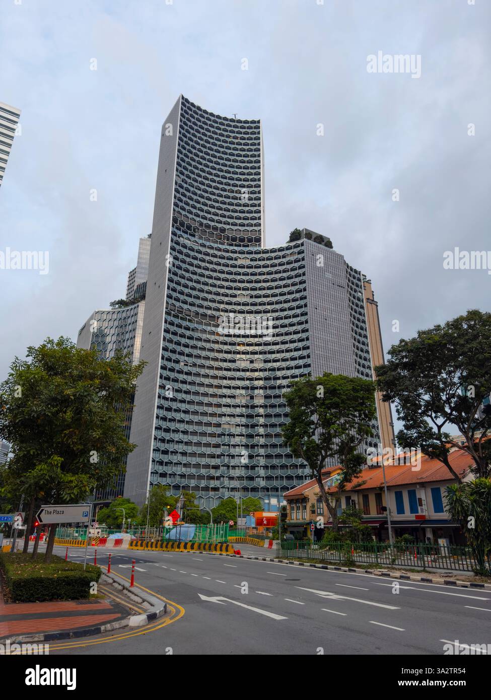 Historic buildings on Beach Road with modern Parkview Square and DUO ...