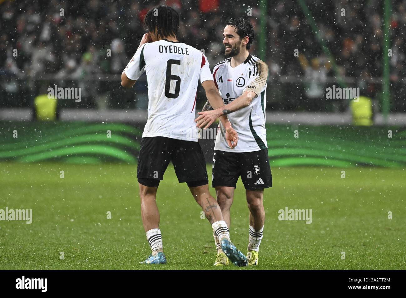 Warszawa, Poland. 13th Mar, 2025. Maxi Oyedele and Claude Goncalves ...