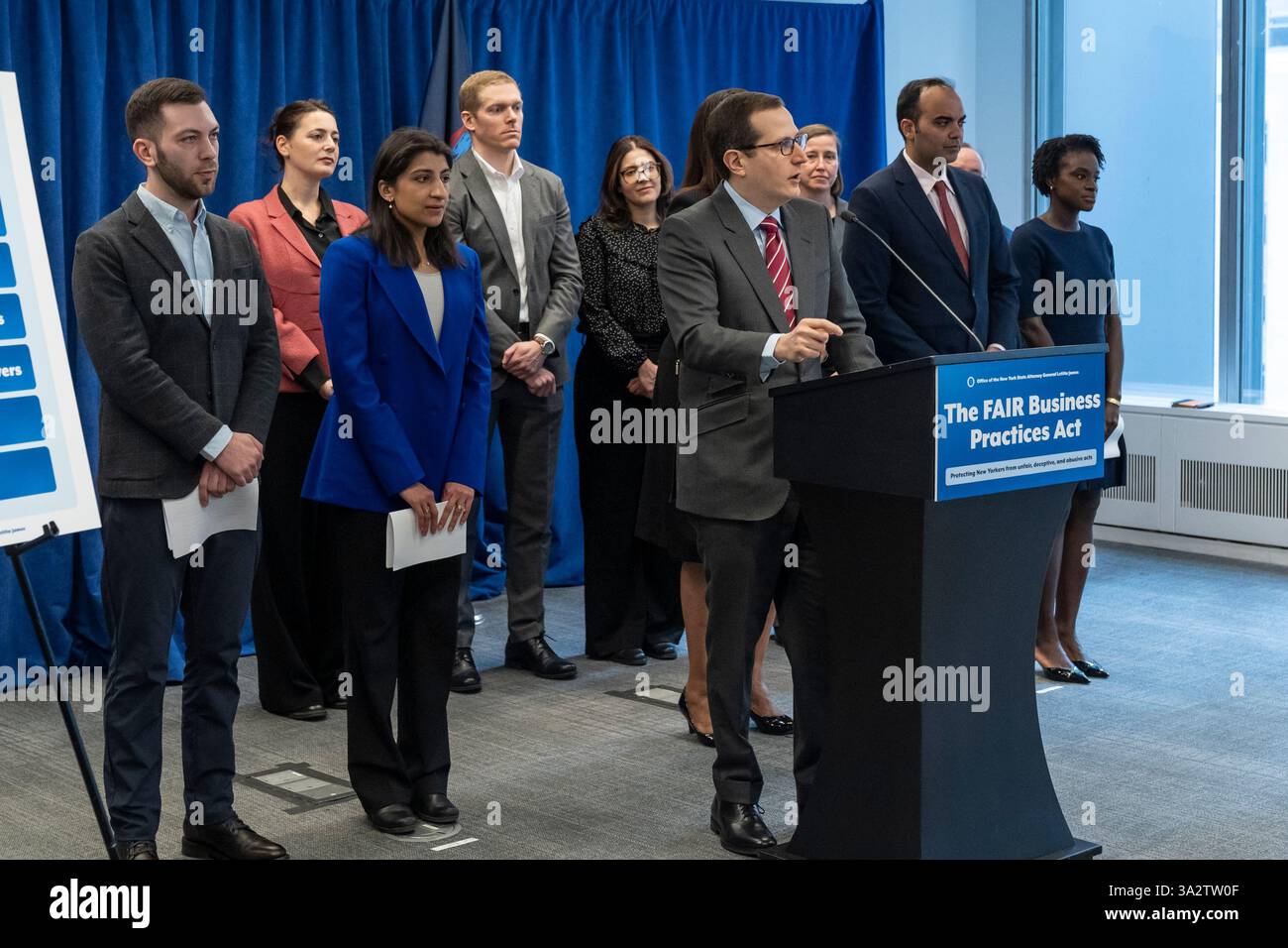 Assemblymember Micah Lasher speaks as New York Attorney General Letitia ...