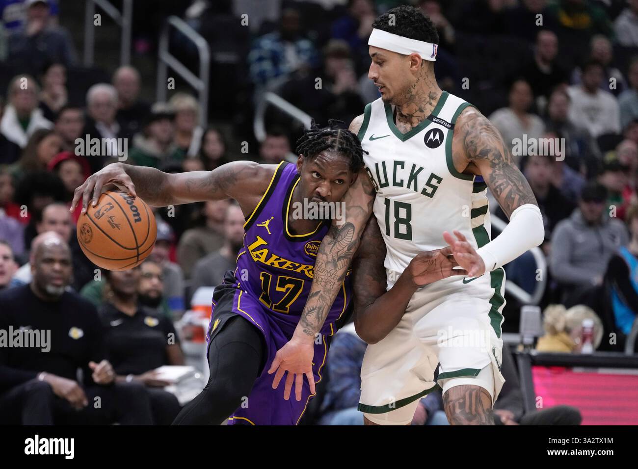 Los Angeles Lakers' Dorian Finney-Smith tries to get past Milwaukee ...