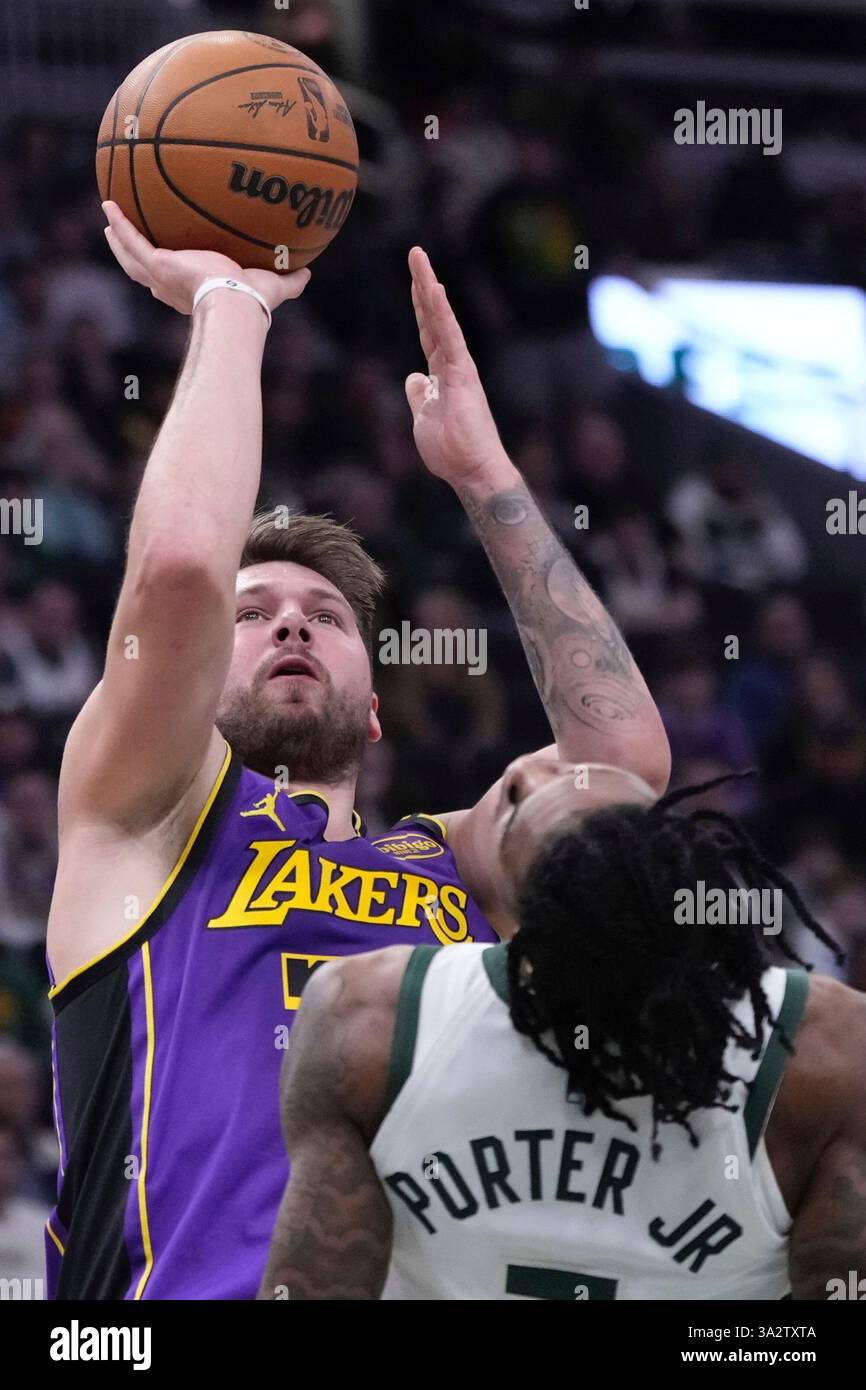 Los Angeles Lakers' Luka Doncic is fouled as he shoots in front of ...