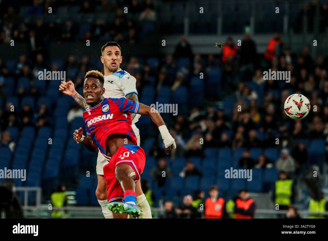 Rome, Italy. 13th Mar, 2025. Matias Vecino of SS LAZIO and Sampson Dweh ...