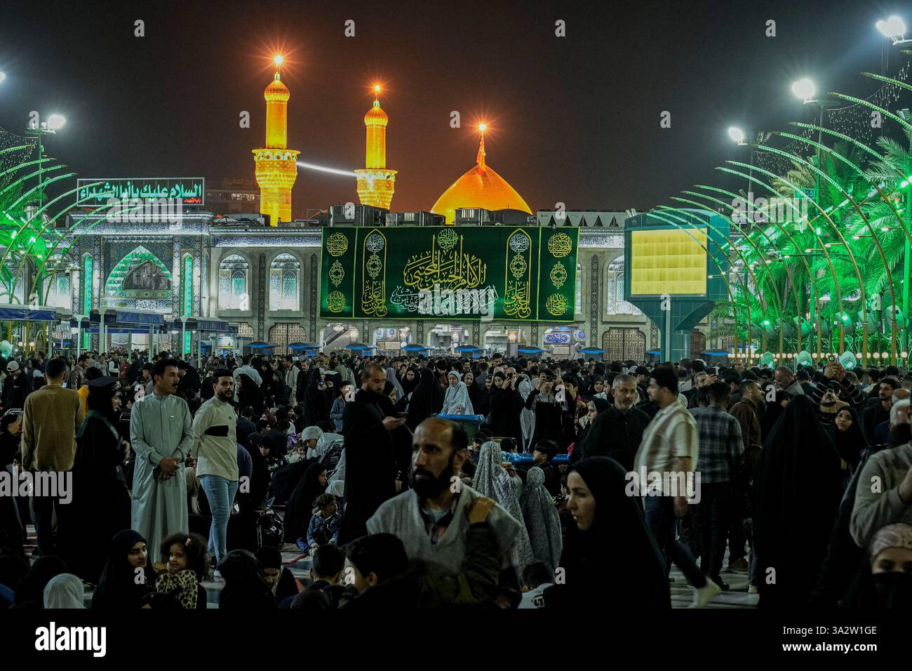 Shiite Muslim pilgrims visit the holy shrine of Imam Hussein during the ...