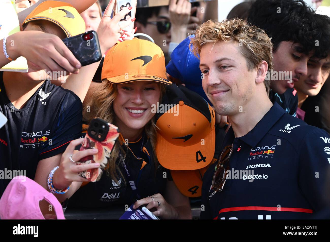 Liam Lawson of Red Bull Racing greets fan on arrival at the Albert Park ...