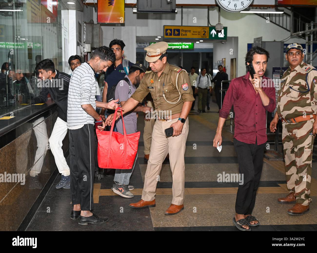 NOIDA, INDIA - MARCH 13: Police officers along with dog squad checking at City Centre Metro ...