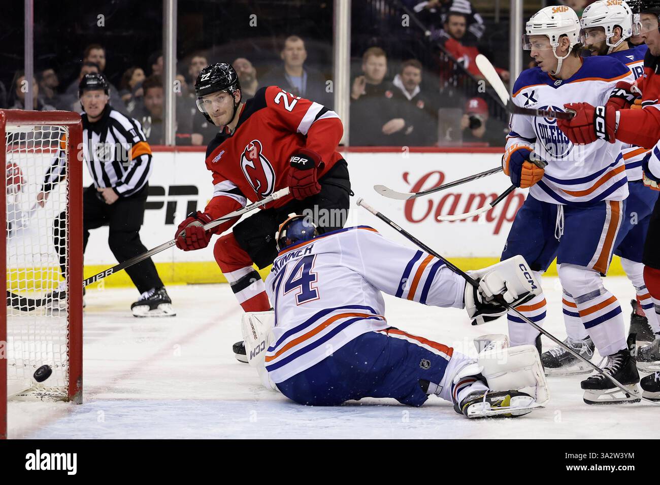 New Jersey Devils defenseman Brett Pesce (22) scores a goal past ...