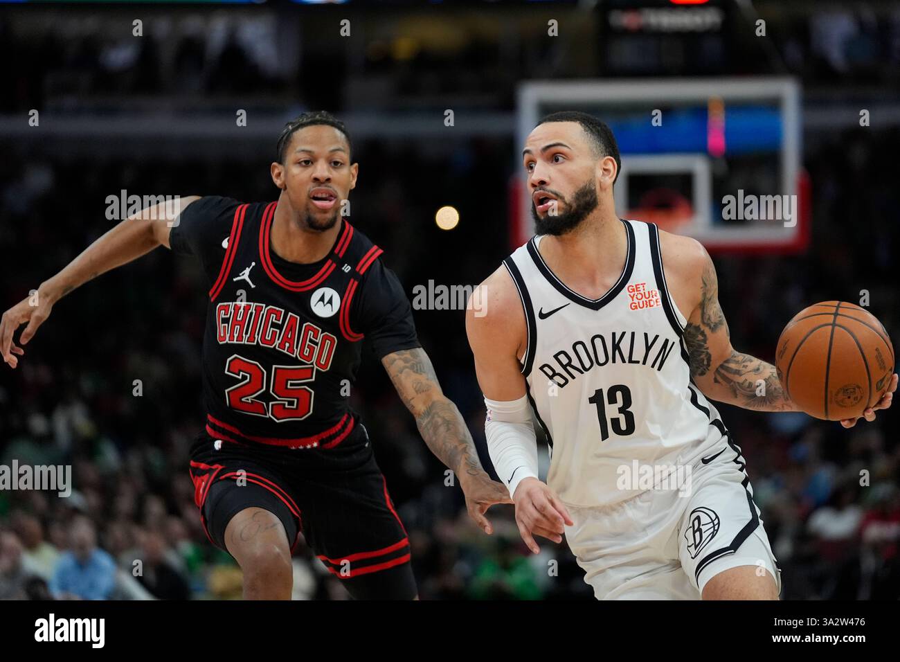 Chicago Bulls forward Dalen Terry (25), left, guards Brooklyn Nets ...