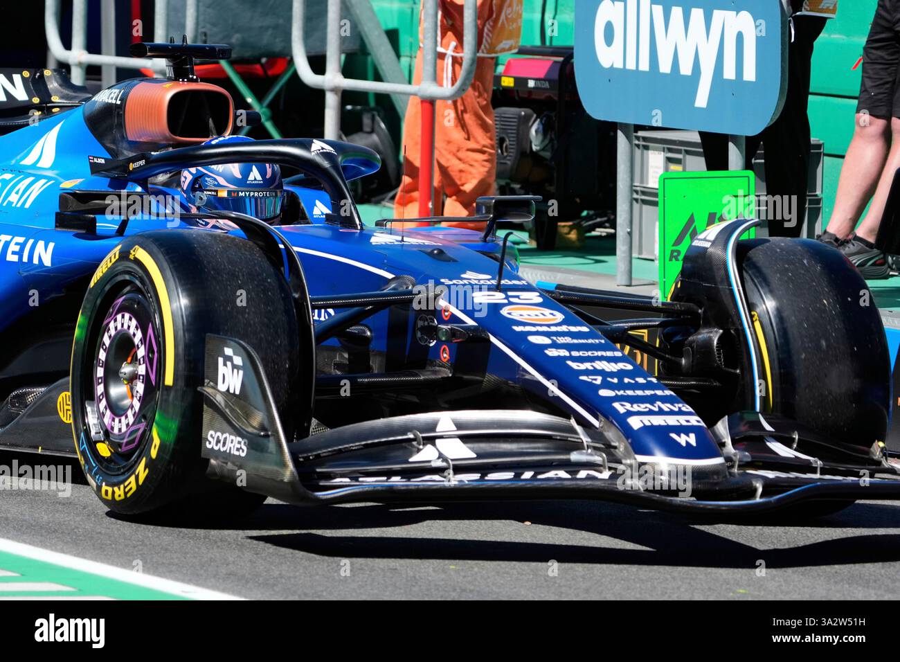 Williams driver Alexander Albon of Thailand steers his car down pit ...