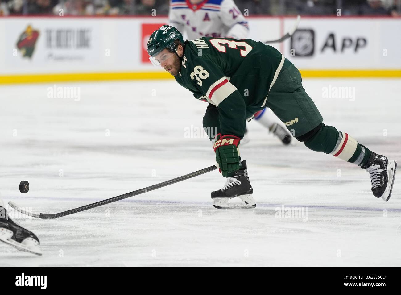 Minnesota Wild right wing Ryan Hartman (38) reaches for the puck during ...