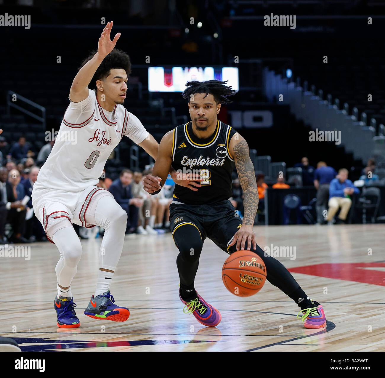 March 13, 2025: La Salle Explorers Guard (2) Corey McKeithan looks to ...