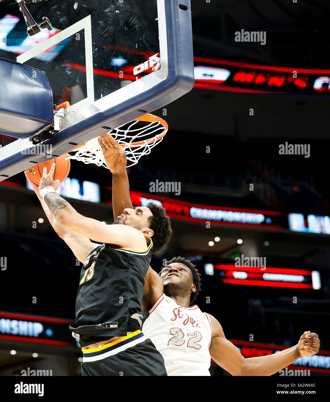 March 13, 2025: La Salle Explorers Guard (13) Daeshon Shepherd goes to ...