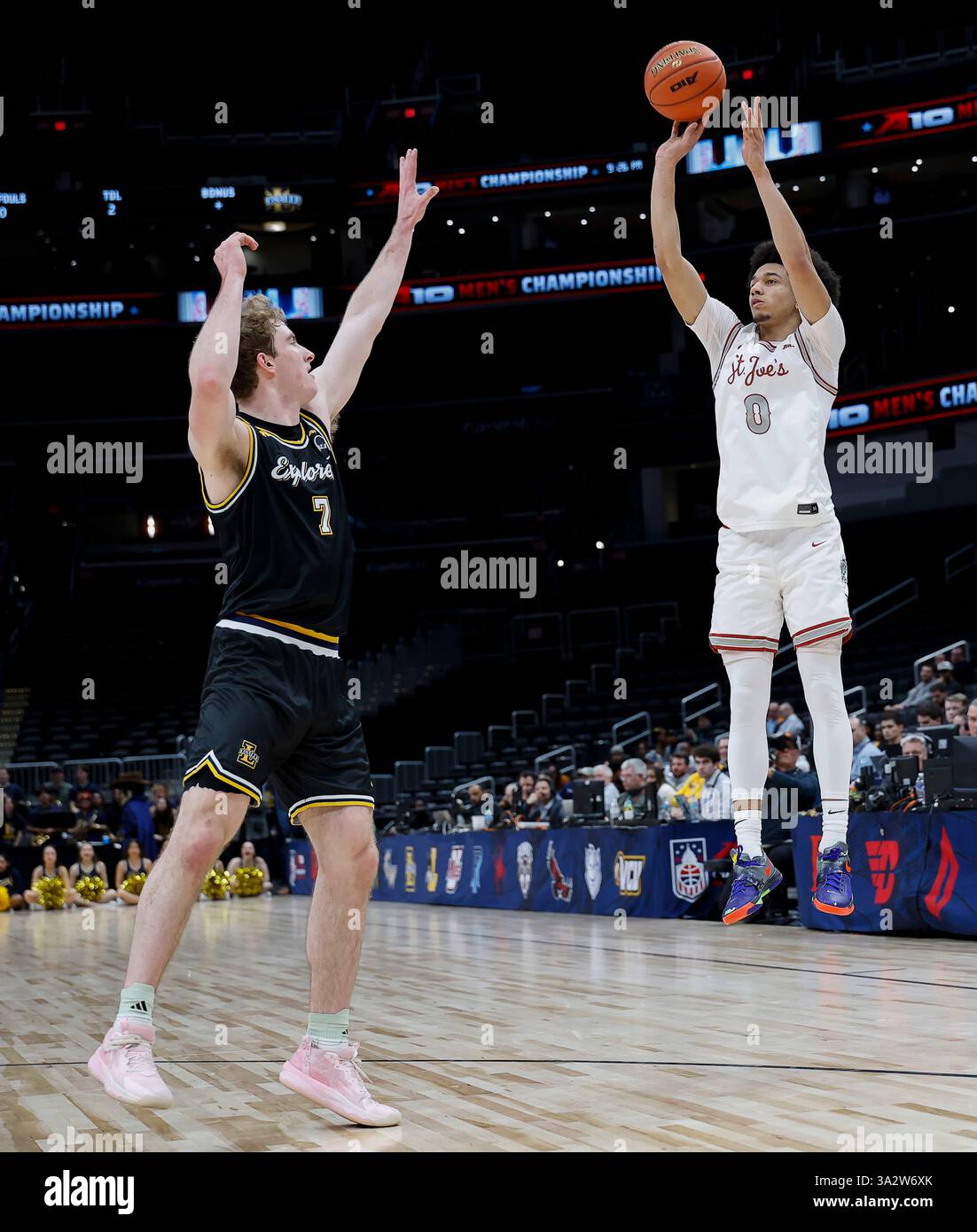 March 13, 2025: Saint Joseph's Hawks Guard (0) Derek Simpson puts up a ...