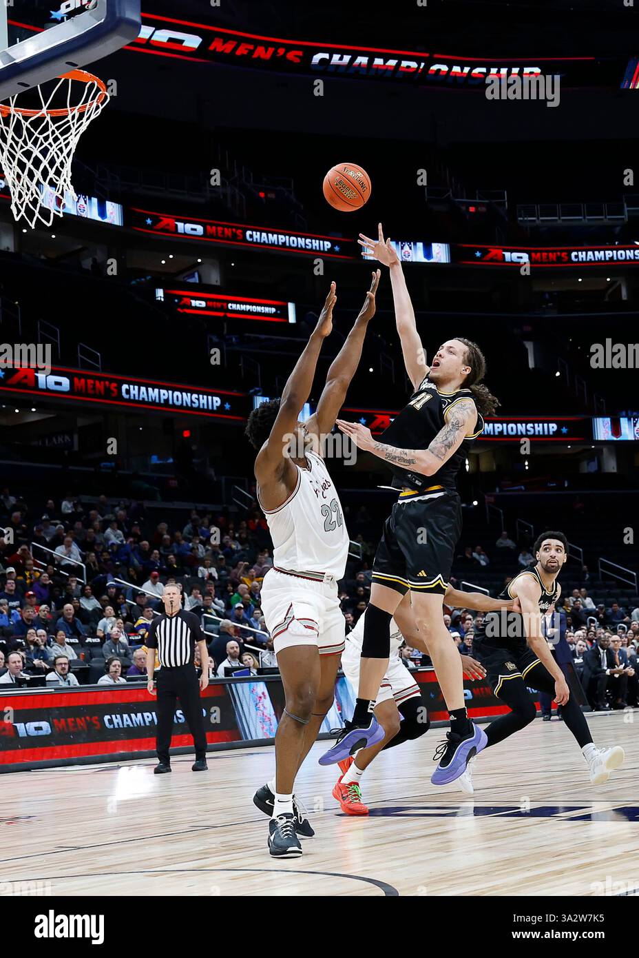 March 13, 2025: La Salle Explorers Forward (21) Mac Etienne throws up a ...