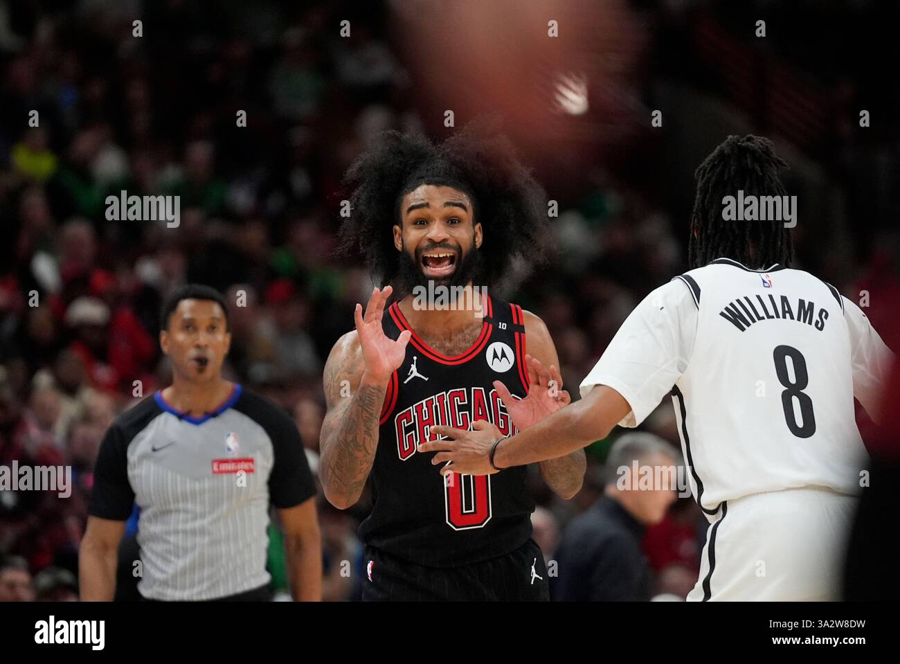 Chicago Bulls guard Coby White (0) shouts to a teammate during the ...
