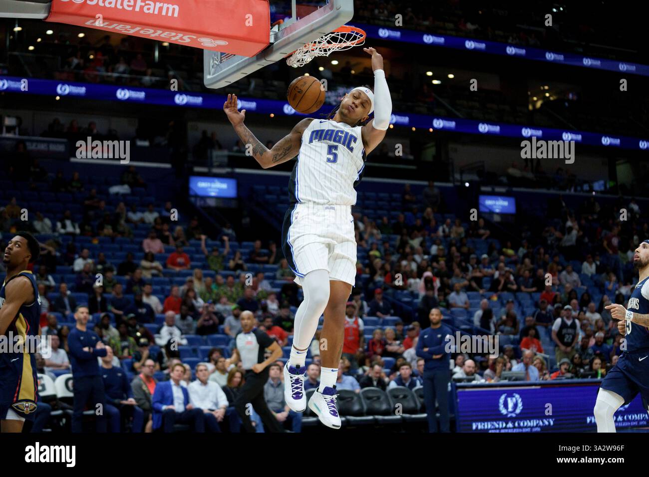 Orlando Magic forward Paolo Banchero (5) breaks free for a dunk against New Orleans Pelicans ...