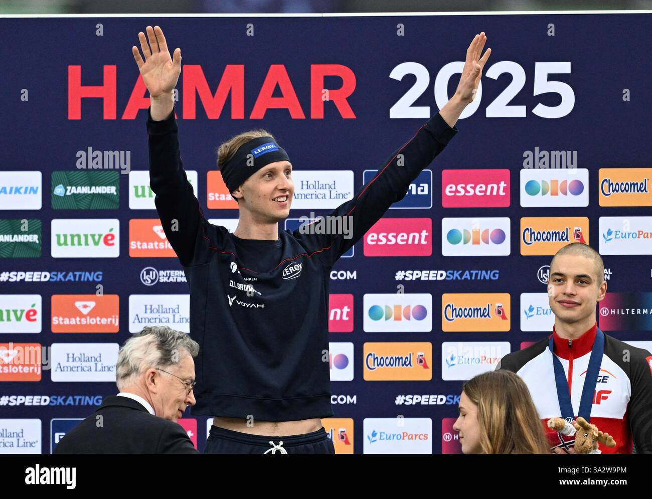 Sander Eitrem of Norway, gold, and Vladimir Semirunniy of Poland, bronze, attend an award ...