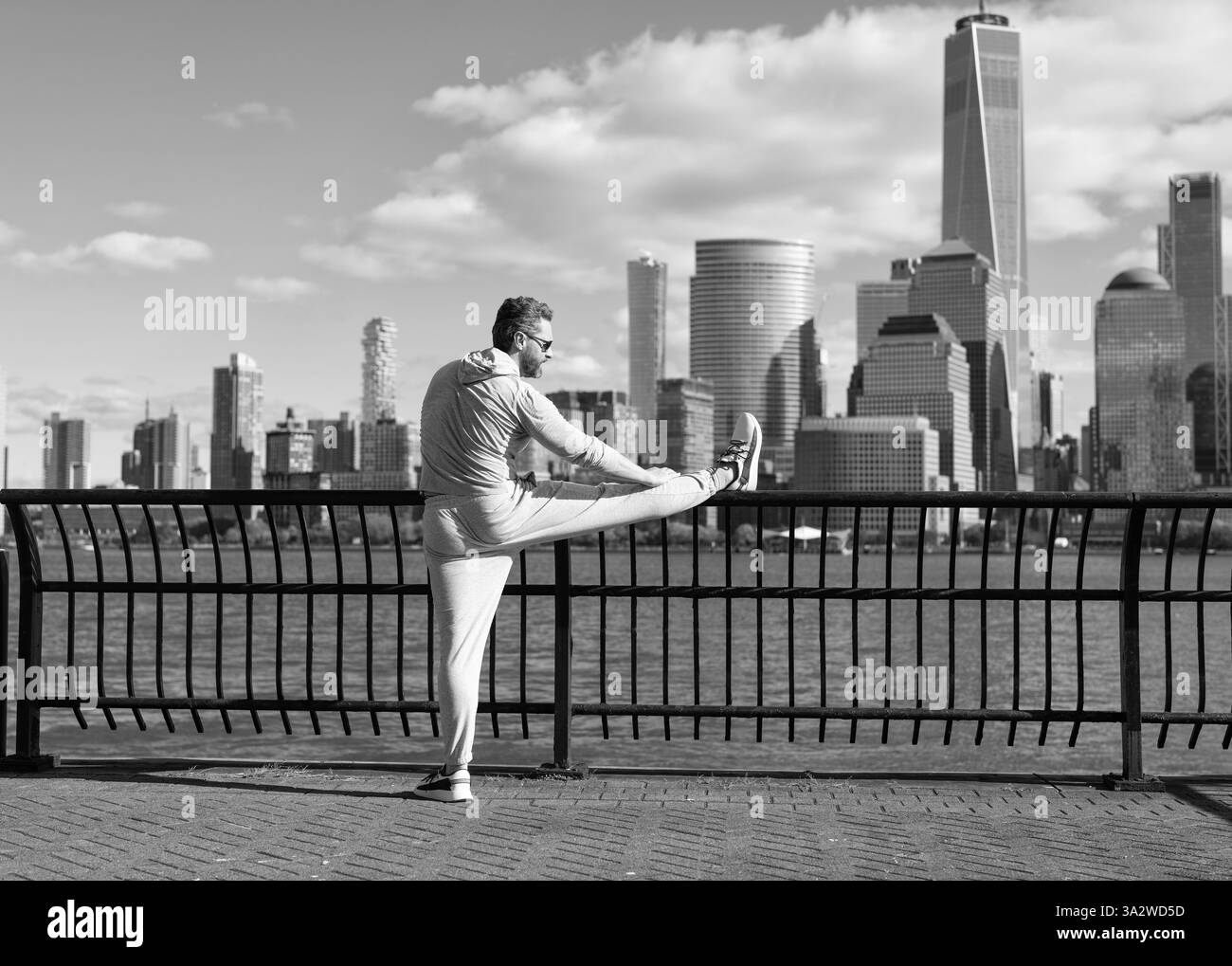 Athlete stretching to improve flexibility. Athlete stretching muscles ...