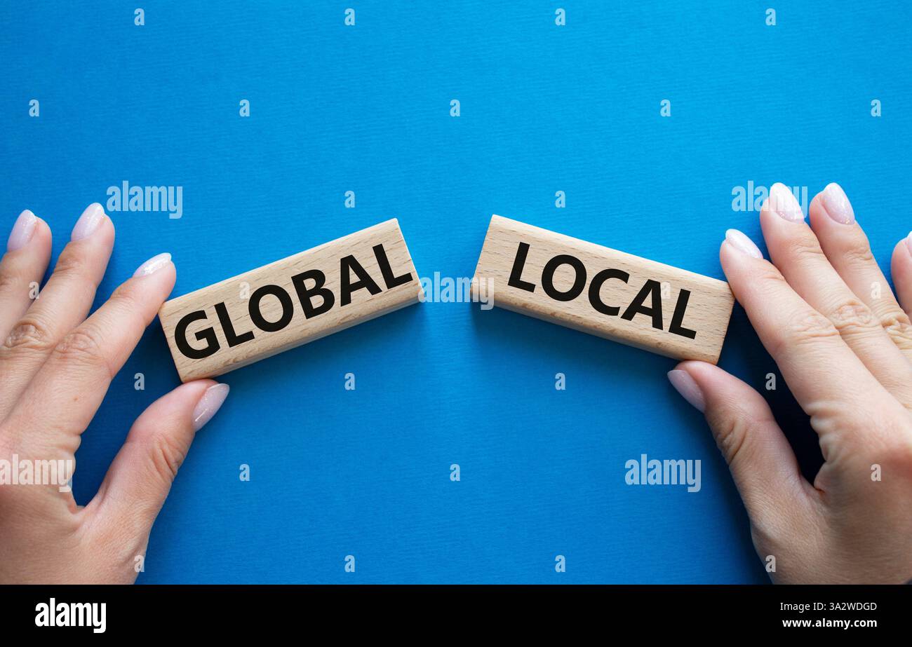 Global and Local symbol. Concept word Global and Local on wooden blocks ...