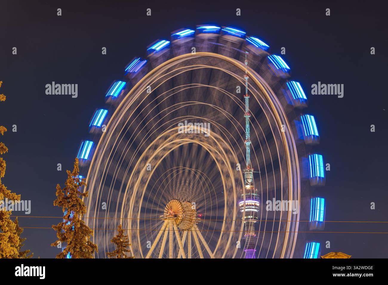 View of the 'Sun of Moscow' Ferris wheel located in VDNKh park in ...