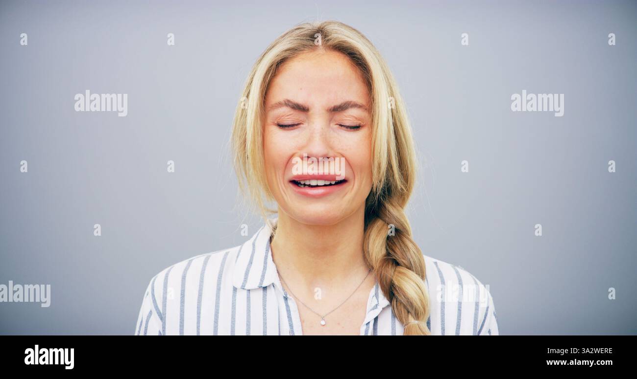 Depression, woman and unhappy with crying in studio for sadness, sorrow ...