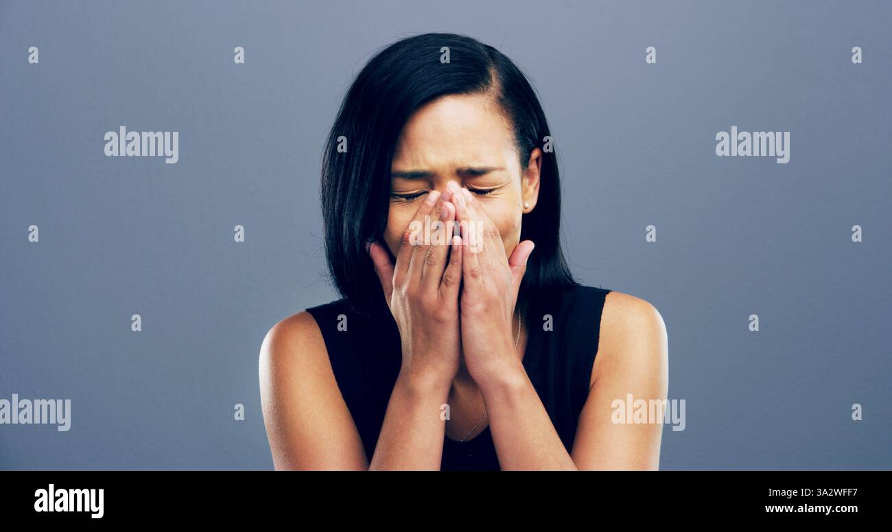 Pain, crying and woman with heartbreak, studio and sad for loss of ...