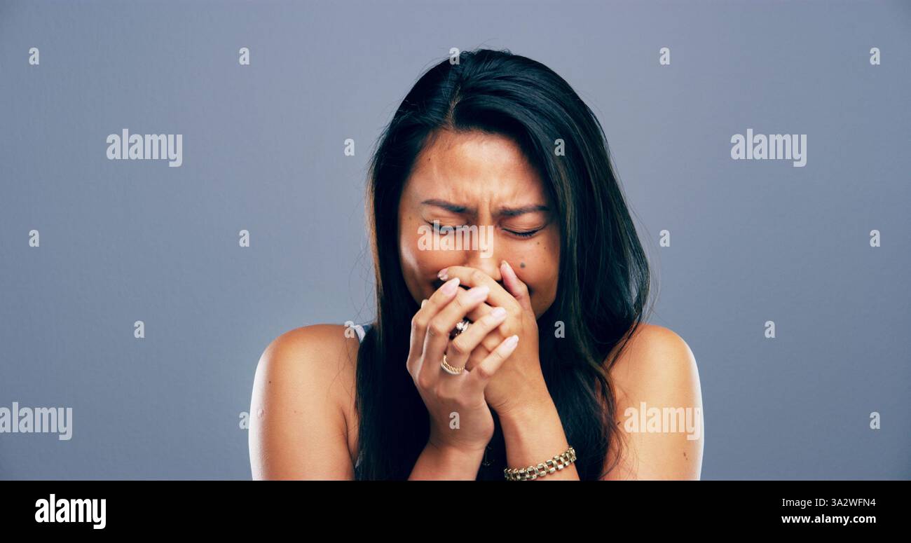 Grief, crying and woman with heartbreak, studio and sad for loss of ...