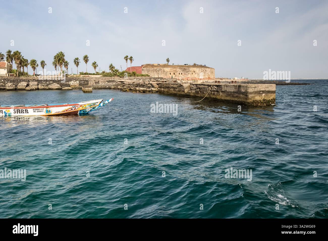 Gorée Island, Senegal – View of its pier, 3 km off Dakar. Fishing boats ...