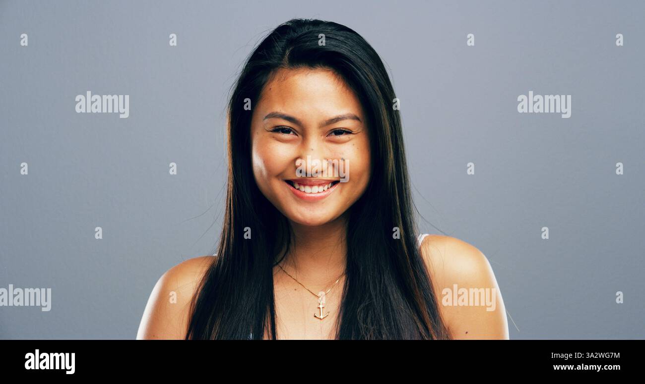 Happy, asian woman or portrait with hair style, positive attitude or ...