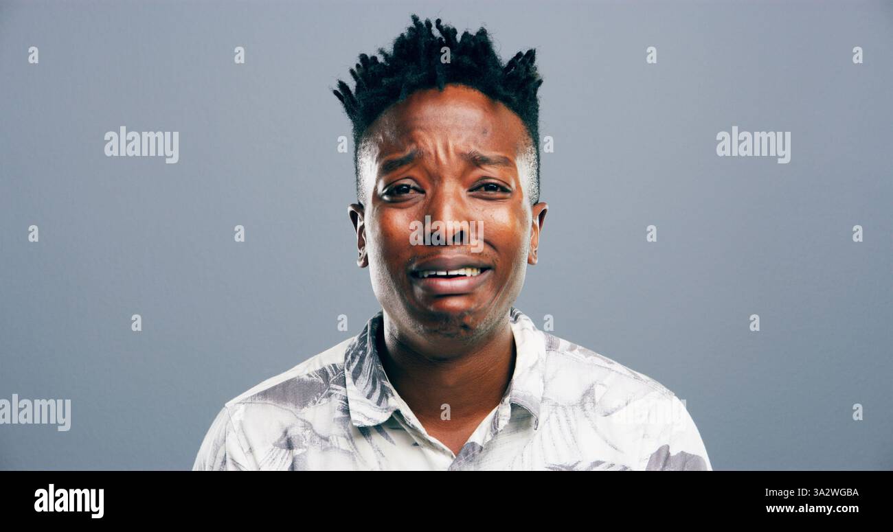 Crying, sad and portrait of black man in studio with grief, heartbreak ...
