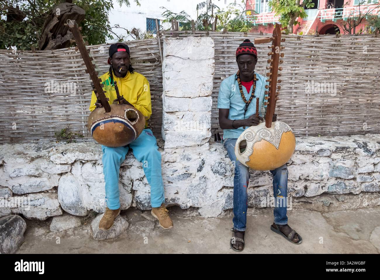 Gorée Island, Senegal – Two musicians play the kora, a West African ...