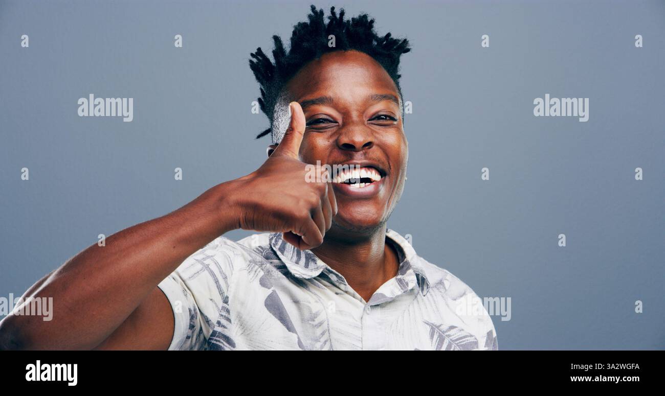 Happy, black man or portrait with thumbs up for positive reaction on a ...