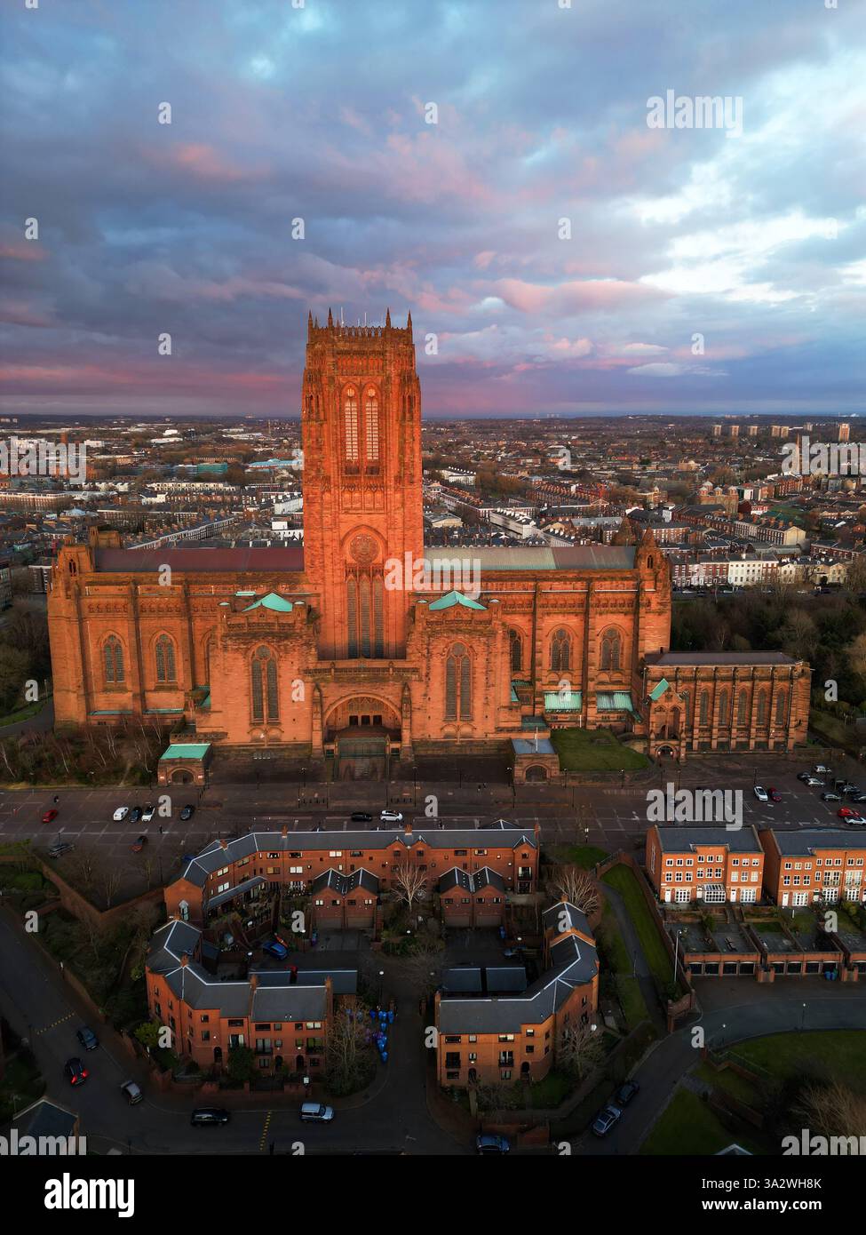 Aerial drone view of Liverpool Cathedral at sunset, showcasing its ...