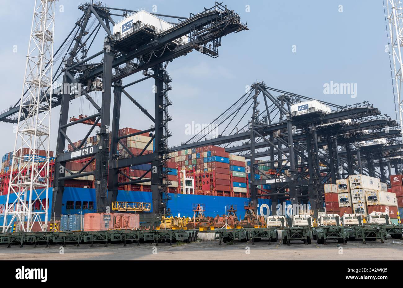 Hong Kong. China- 02.18.2025. Ground view of port cranes loading ...