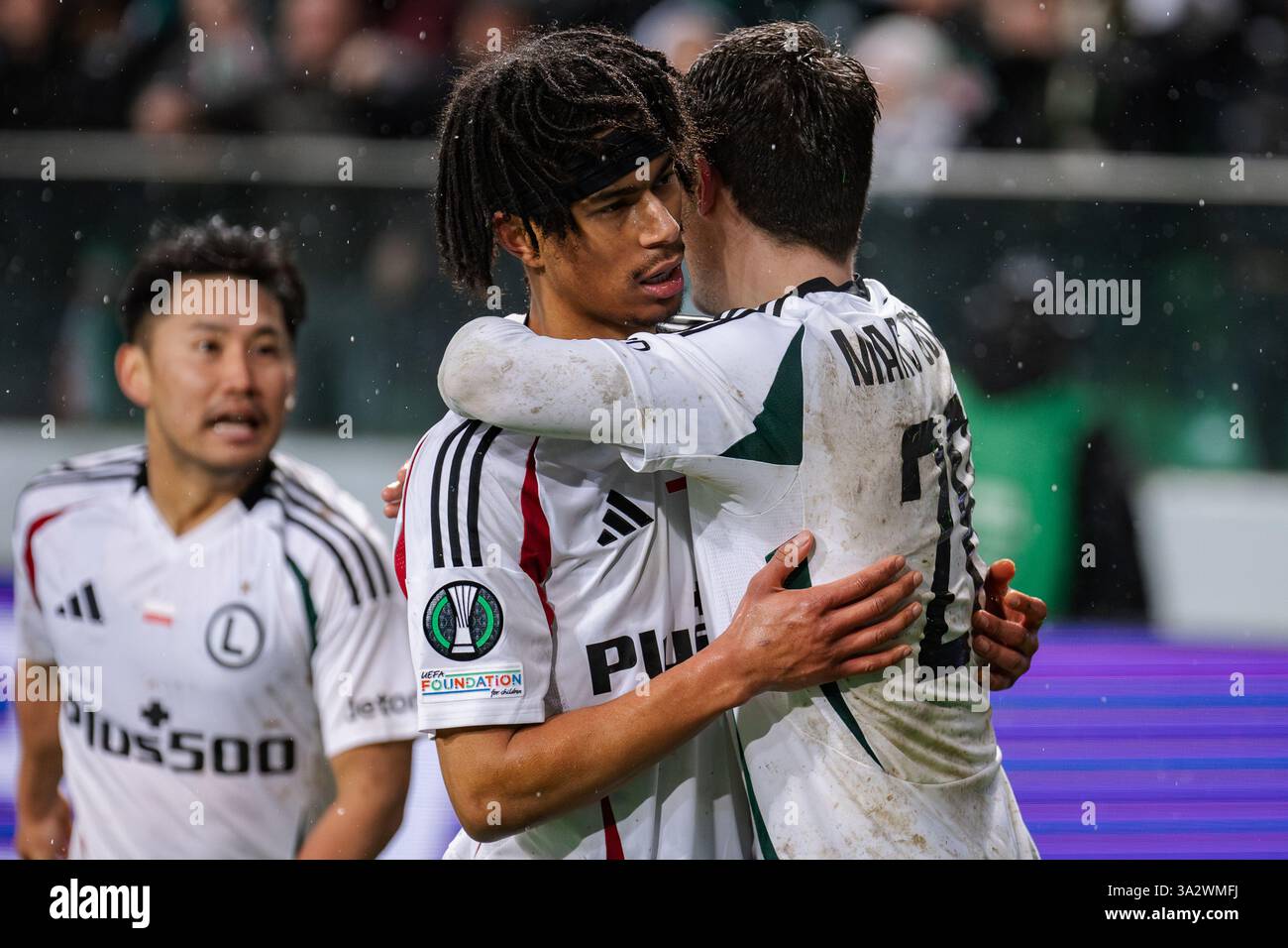 Warsaw, Poland. 14th Mar, 2025. Maximillian Maxi Oyedele (L) and Marc ...
