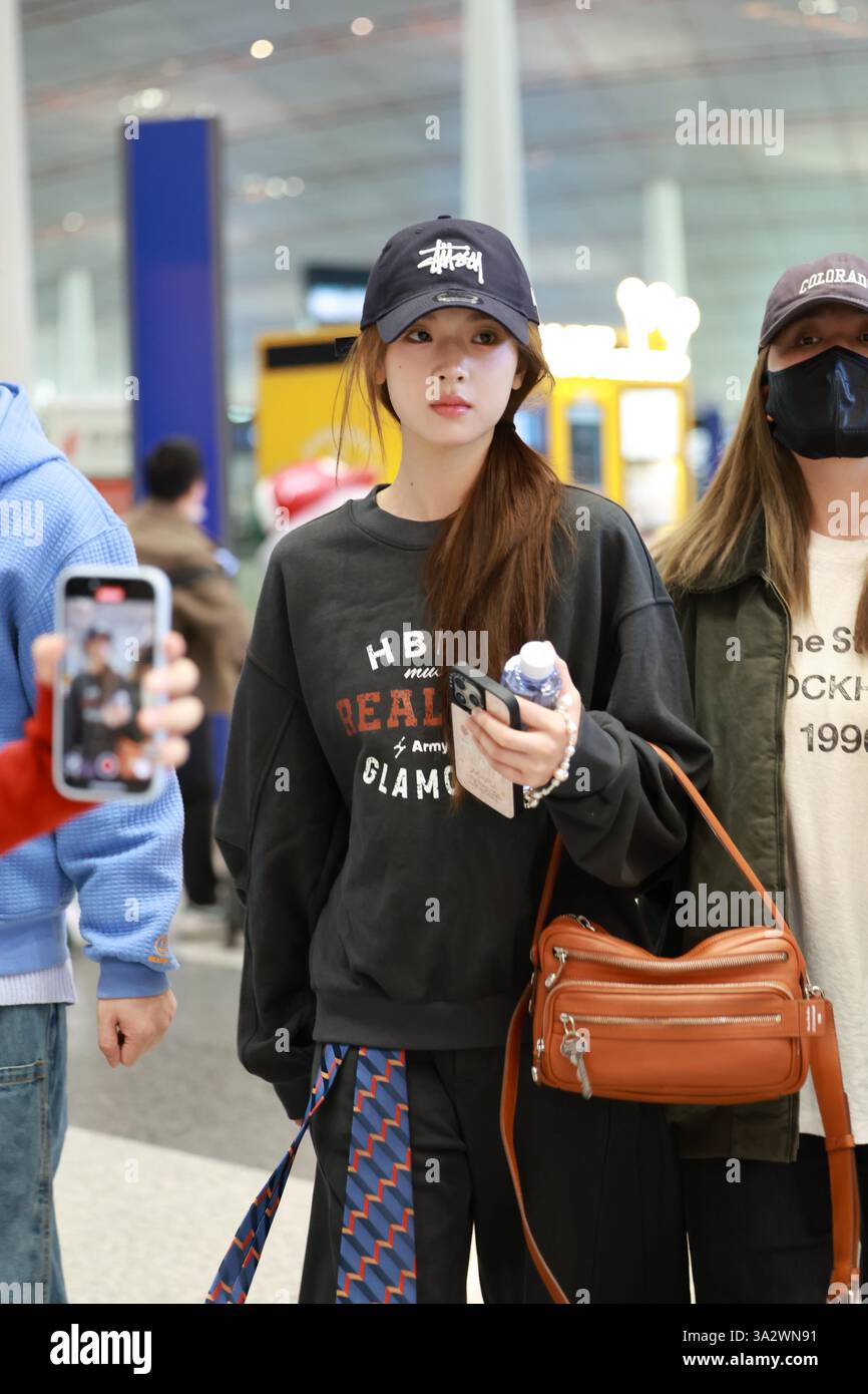 Chinese actress Zhang Miaoyi appears at the airport in Beijing, China ...
