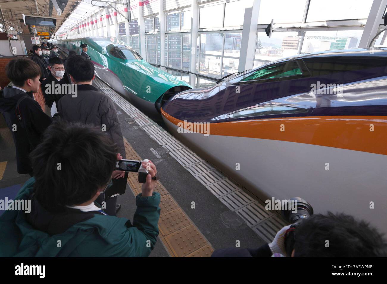 A Tohoku Shinkansen train Yamabiko, left, and an Akita Shinkansen Train ...