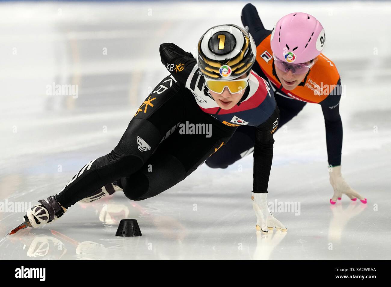 South Korea's Kim Gilli, left and Netherlands' Zoe Deltrap compete in ...