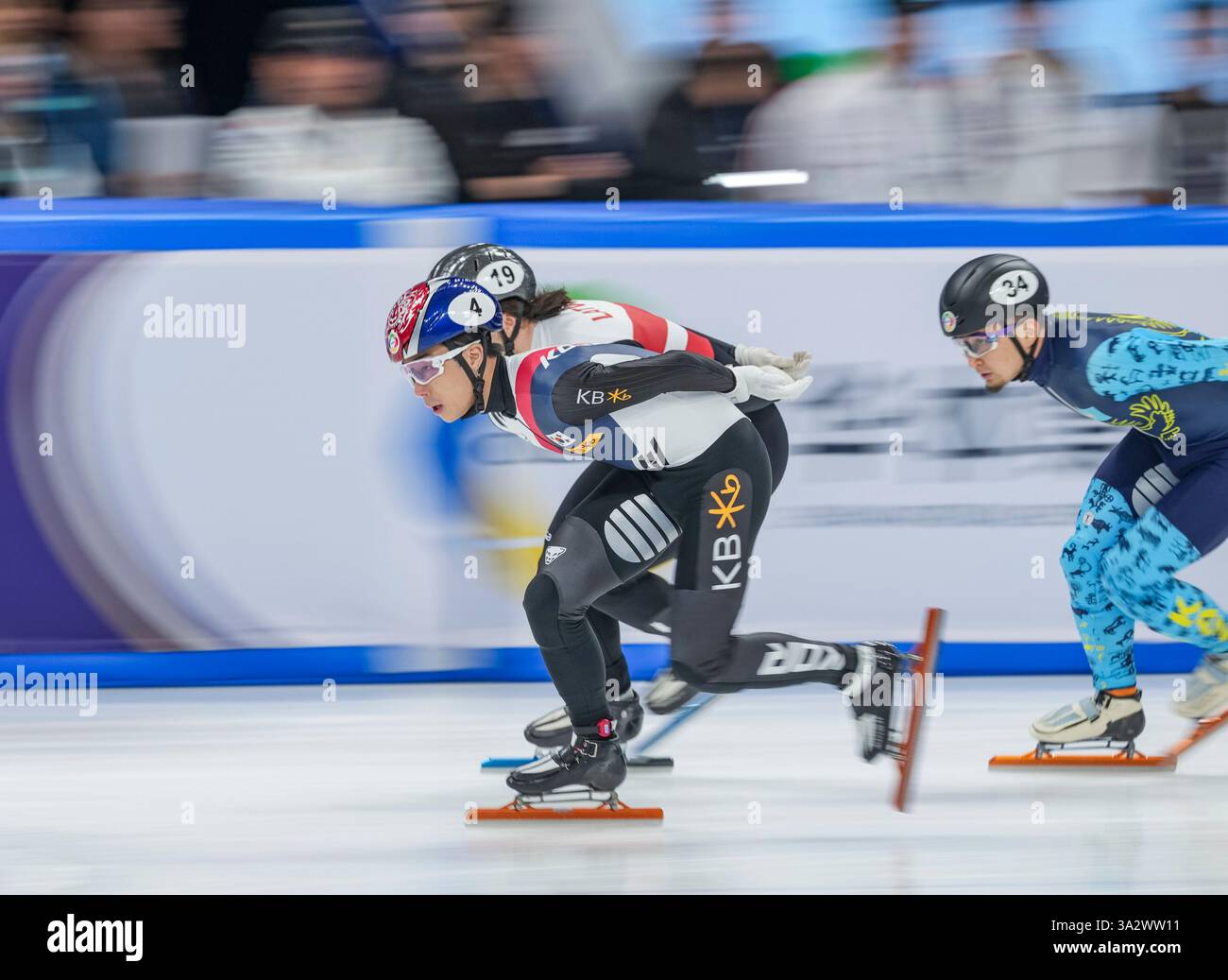 Beijing, China. 14th Mar, 2025. Kim Gunwoo (L) of South Korea competes ...