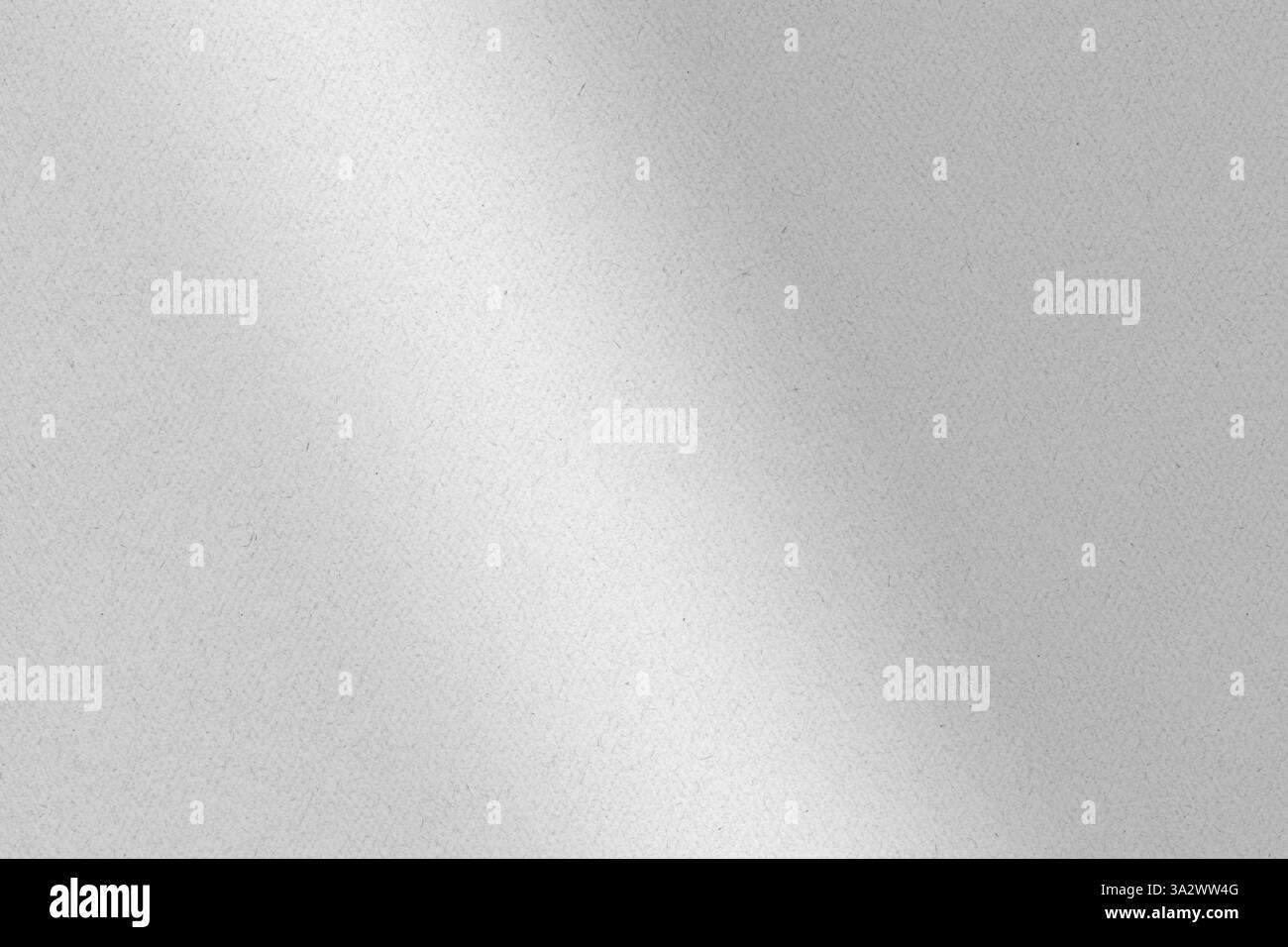 A faint, soft shadow is cast on a white piece of paper, creating a ...