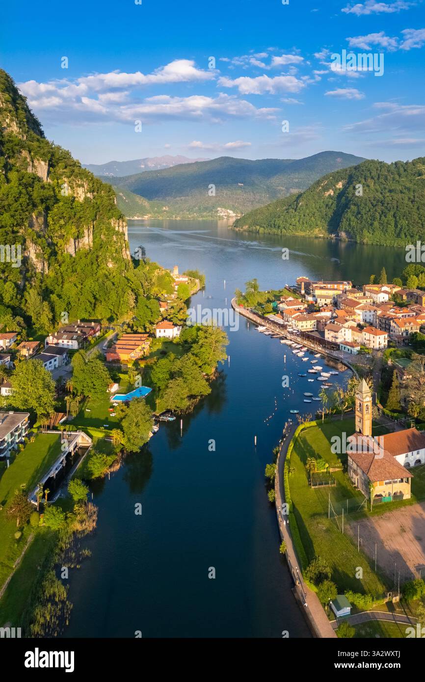 Aerial view of the small italian village of Lavena with its strait at ...