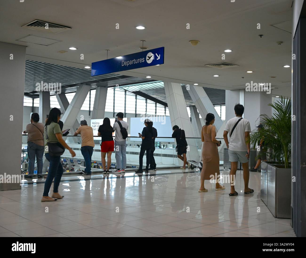 People in Manila airport departure lounge Stock Photo - Alamy