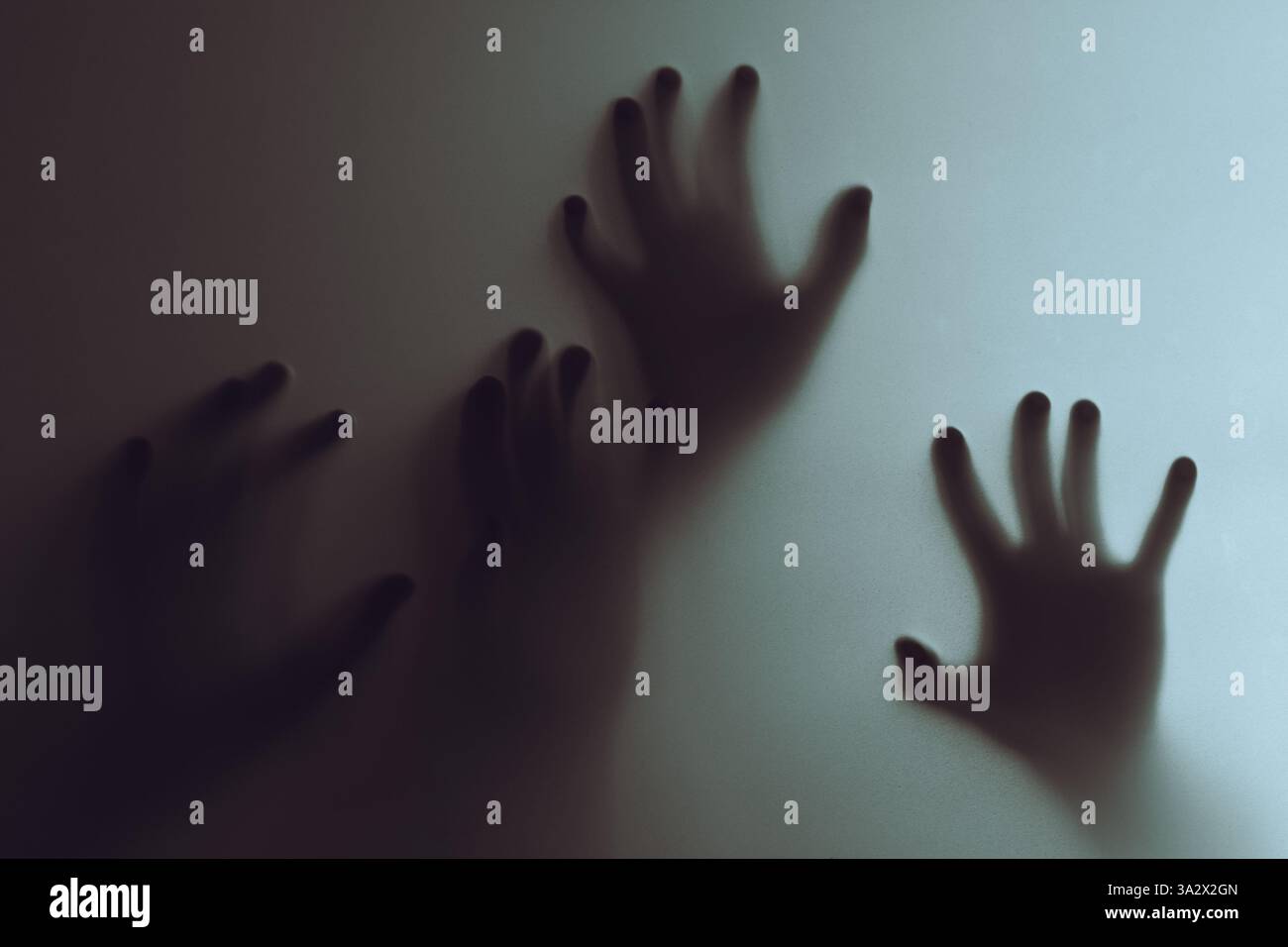 Ghostly hands against dark hi-res stock photography and images - Alamy