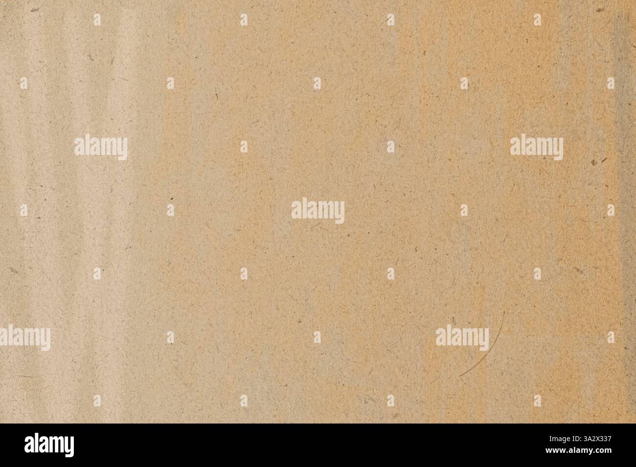 This close-up view highlights the natural texture of beige paper ...