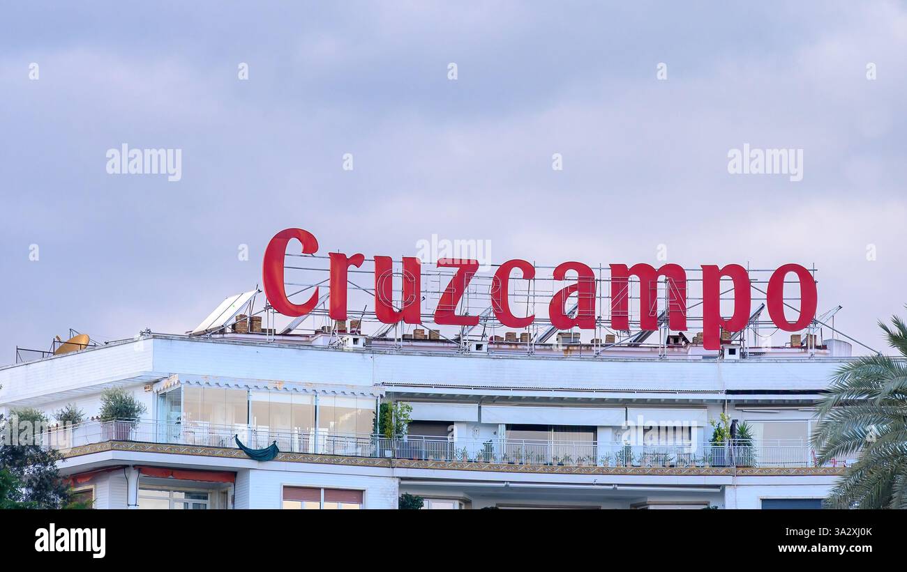 Advertisement sign of Cruzcampo beer on top of a building Stock Photo ...