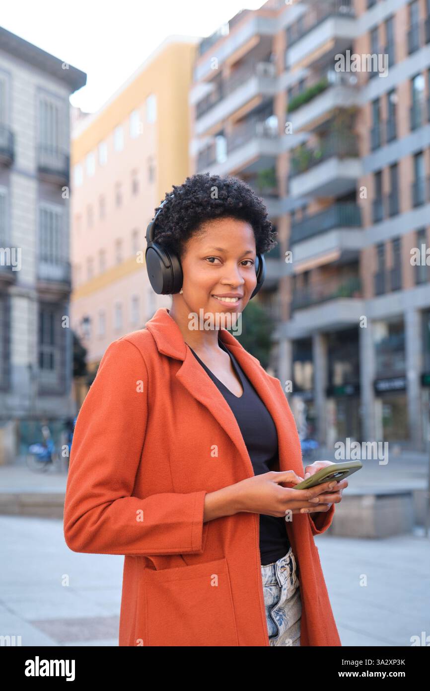 Woman smartphone setting music hi-res stock photography and images - Alamy