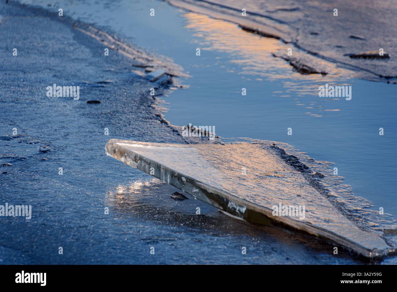 Partially frozen lake surface hi-res stock photography and images - Alamy