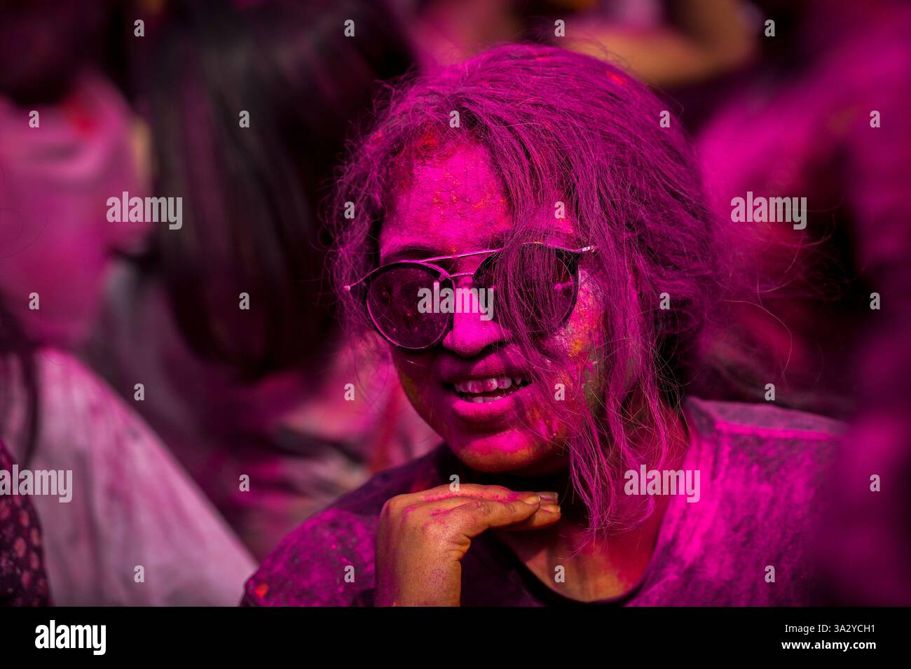 Indians dance smeared in color as they celebrate Holi in Guwahati ...